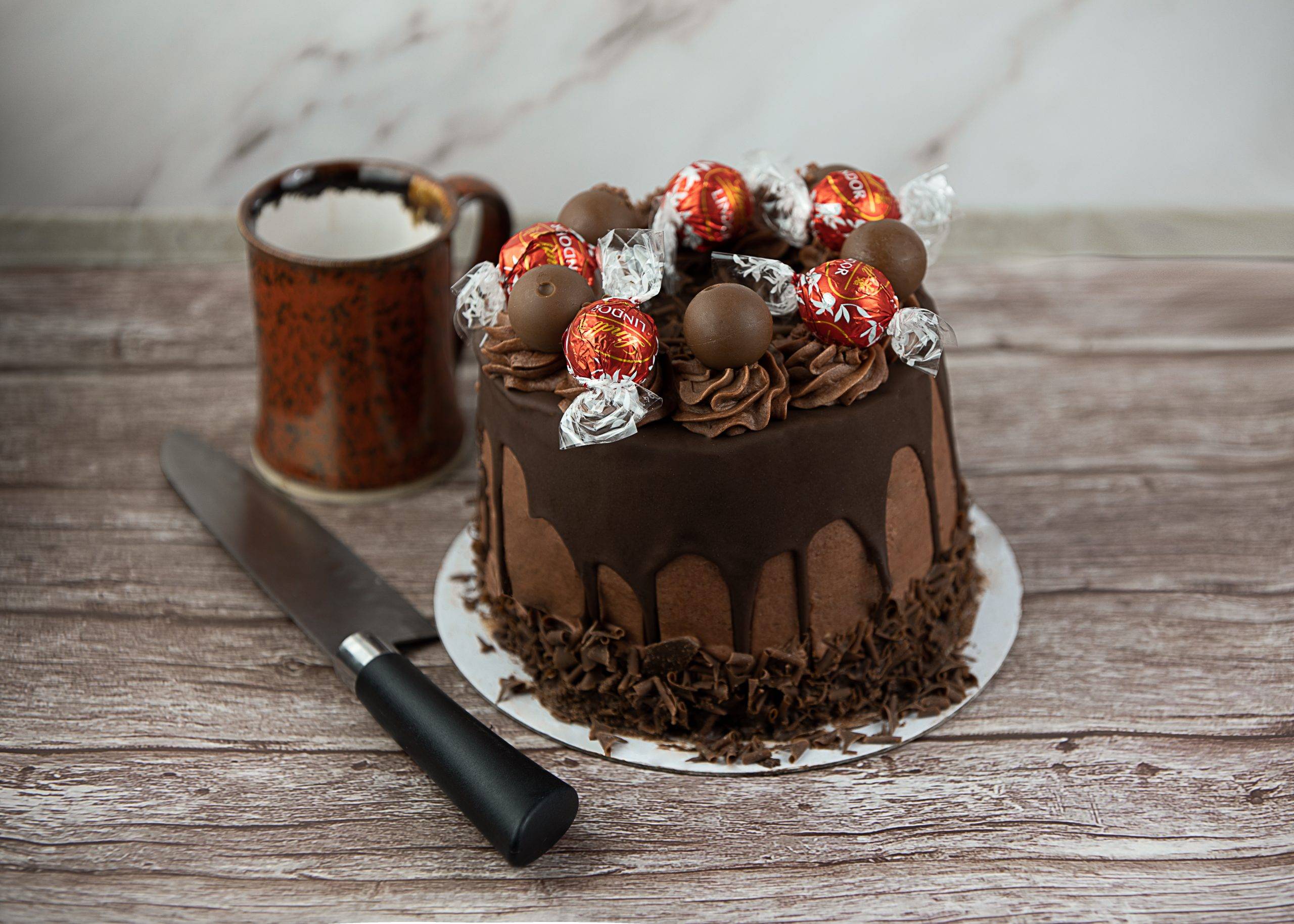 The Lindt Deluxe Chocolate Cake Desserts Delivered Bakery